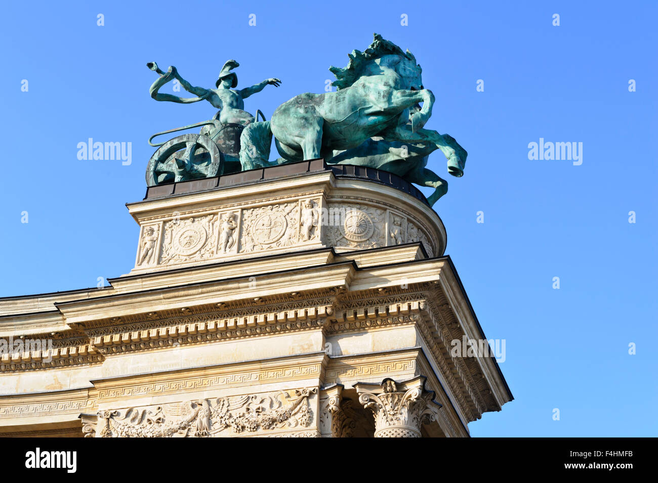 Statue of a man with a snake the symbol of War in a chariot, Heroes ...