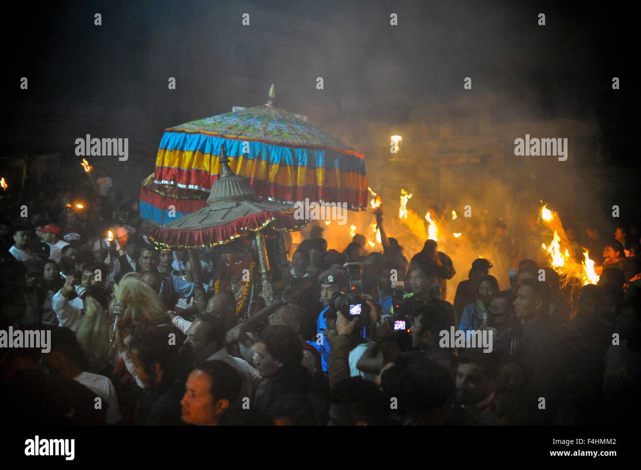 Kathmandu, Nepal. 18th Oct, 2015. A Nepalese devotees lit traditional ...