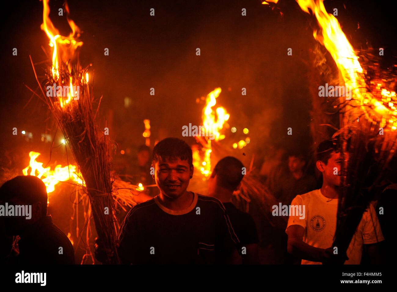 Kathmandu, Nepal. 18th Oct, 2015. A Nepalese devotees lit traditional ...