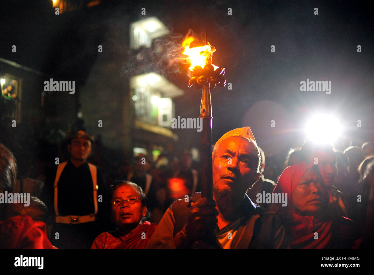 Kathmandu, Nepal. 18th Oct, 2015. A Nepalese devotees lit traditional ...