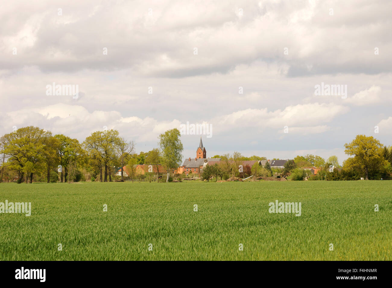 Village with church tower Stock Photo - Alamy