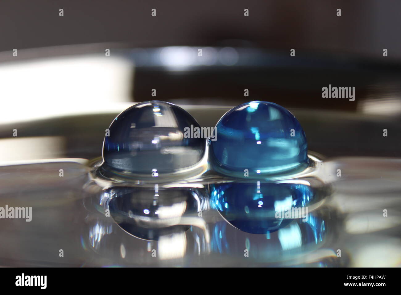 Blobs on liquid surface Stock Photo - Alamy