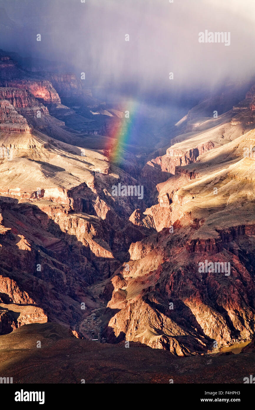 A rainbow forms over Bright Angel Canyon during a rain storm, Grand ...