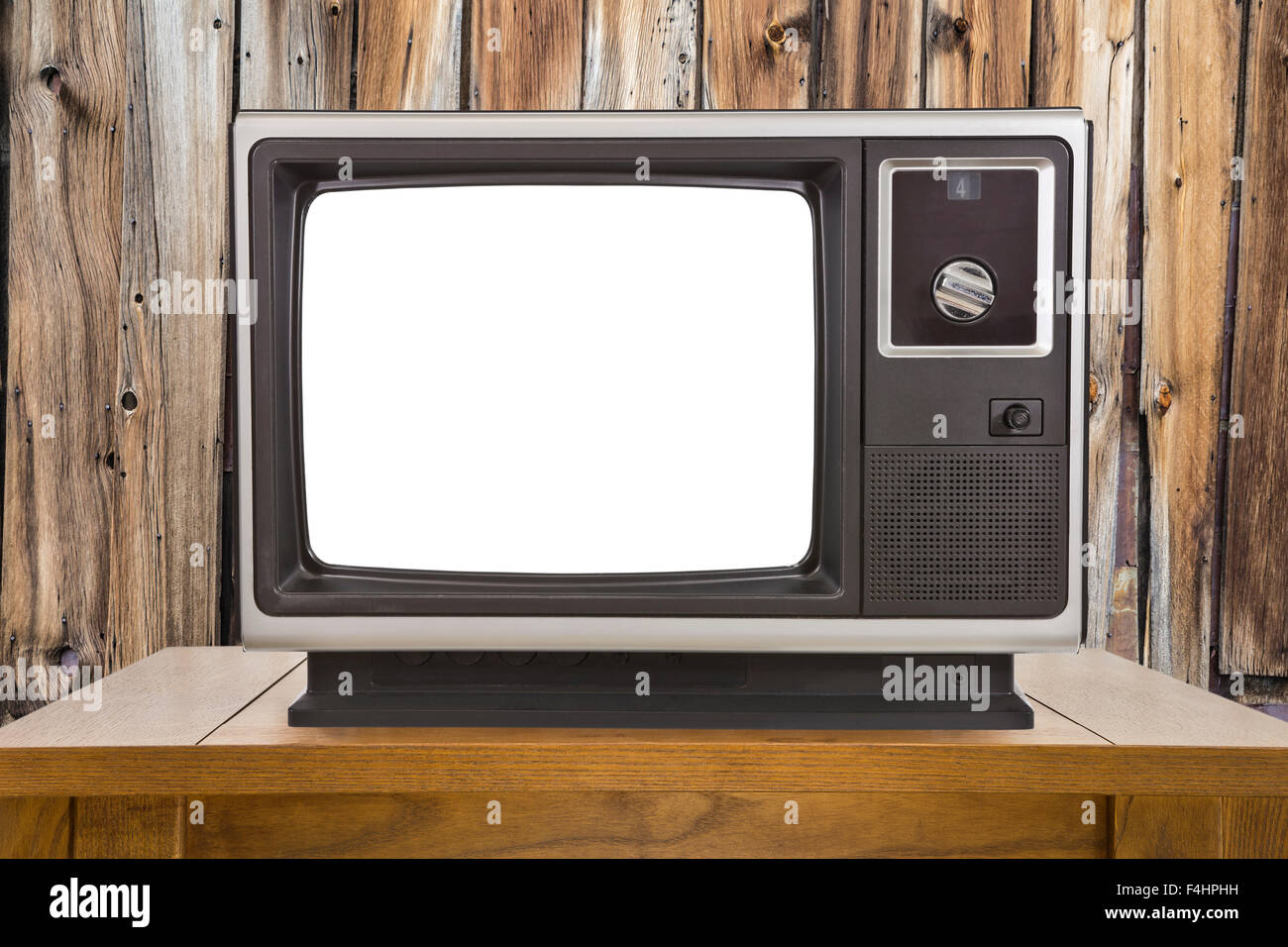 Old portable television with cut out screen and rustic wood wall Stock ...