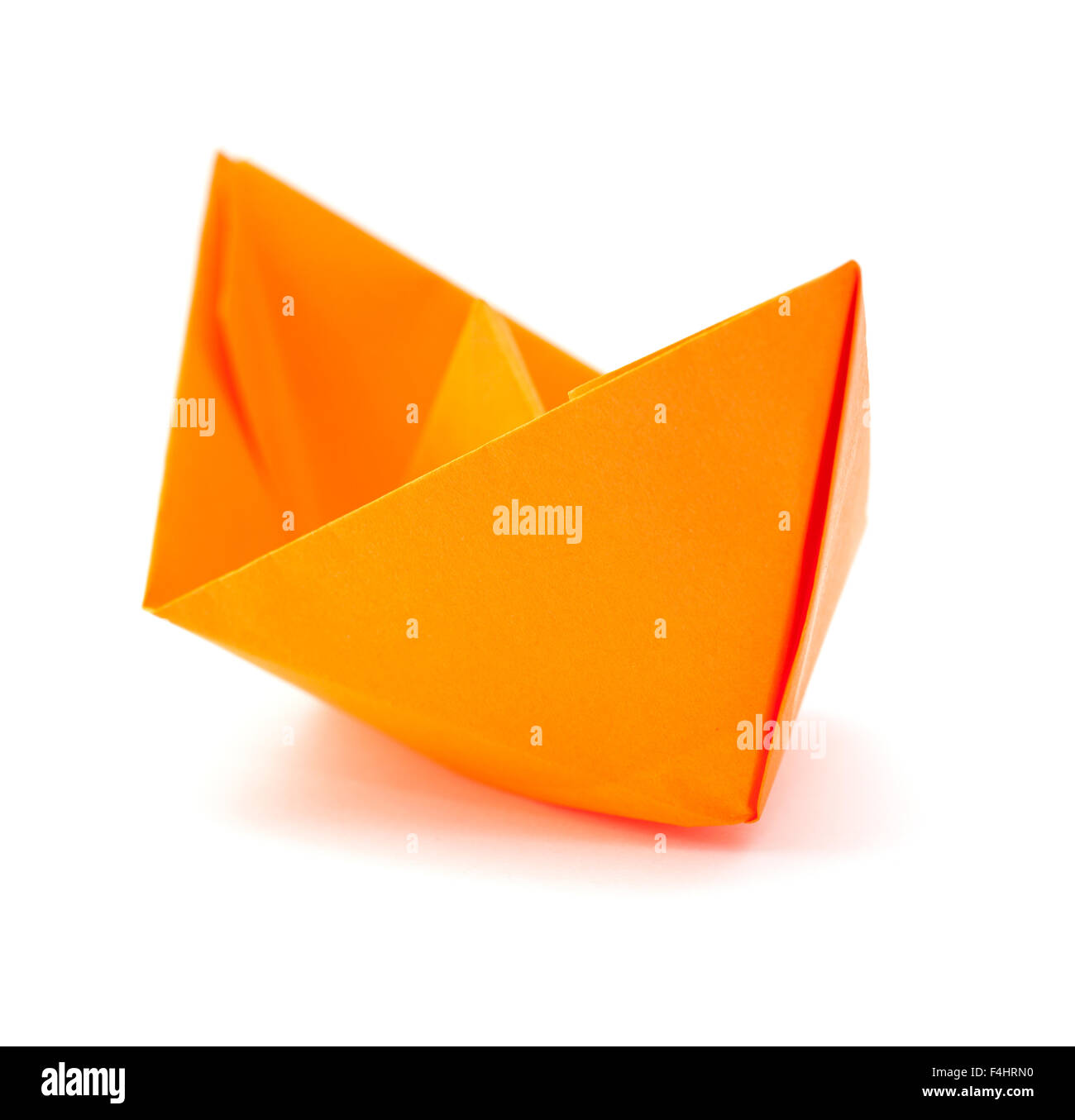 orange origami paper boat isolated on white background Stock Photo - Alamy