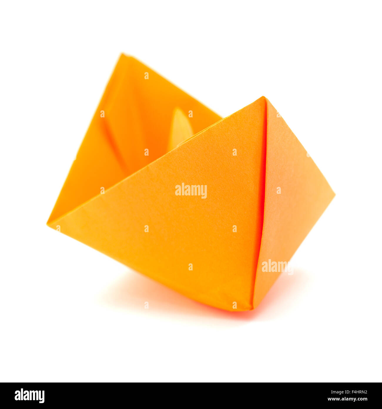 orange origami paper boat isolated on white background Stock Photo - Alamy