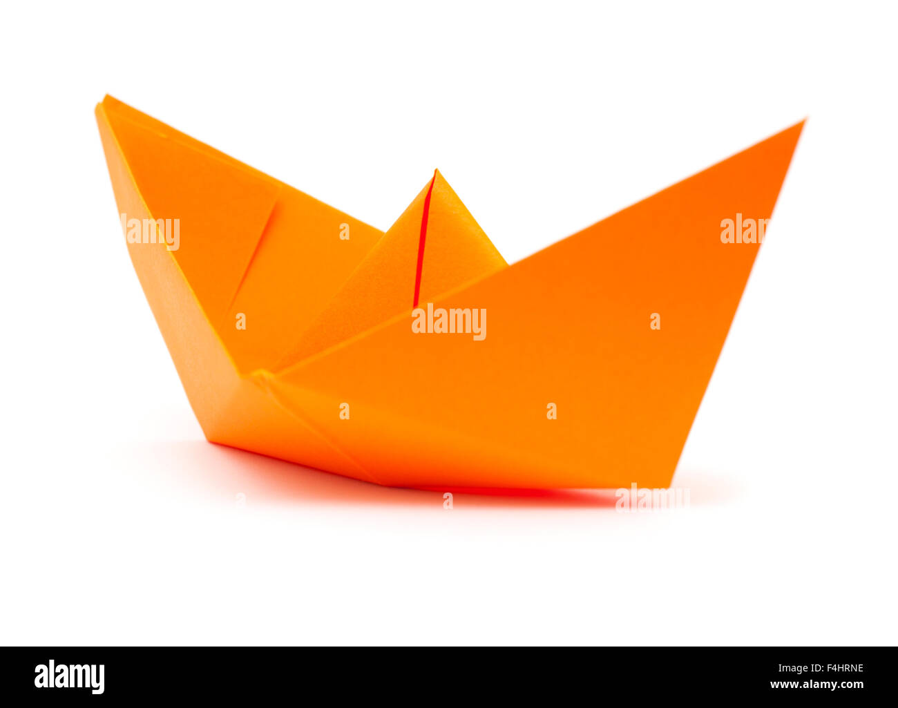 orange origami paper boat isolated on white background Stock Photo - Alamy