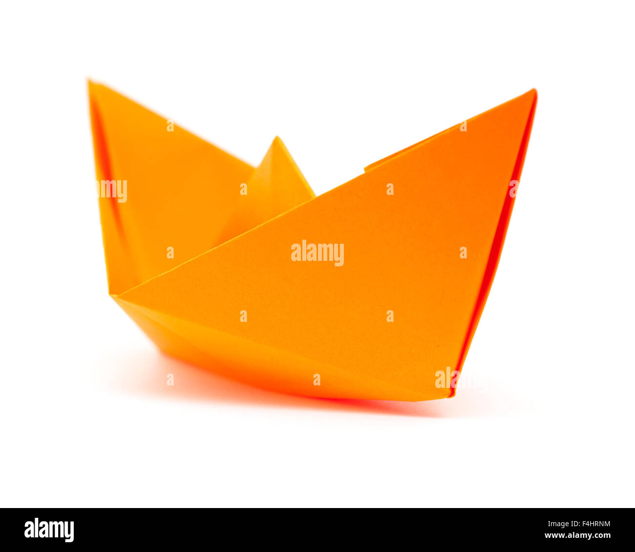 orange origami paper boat isolated on white background Stock Photo - Alamy