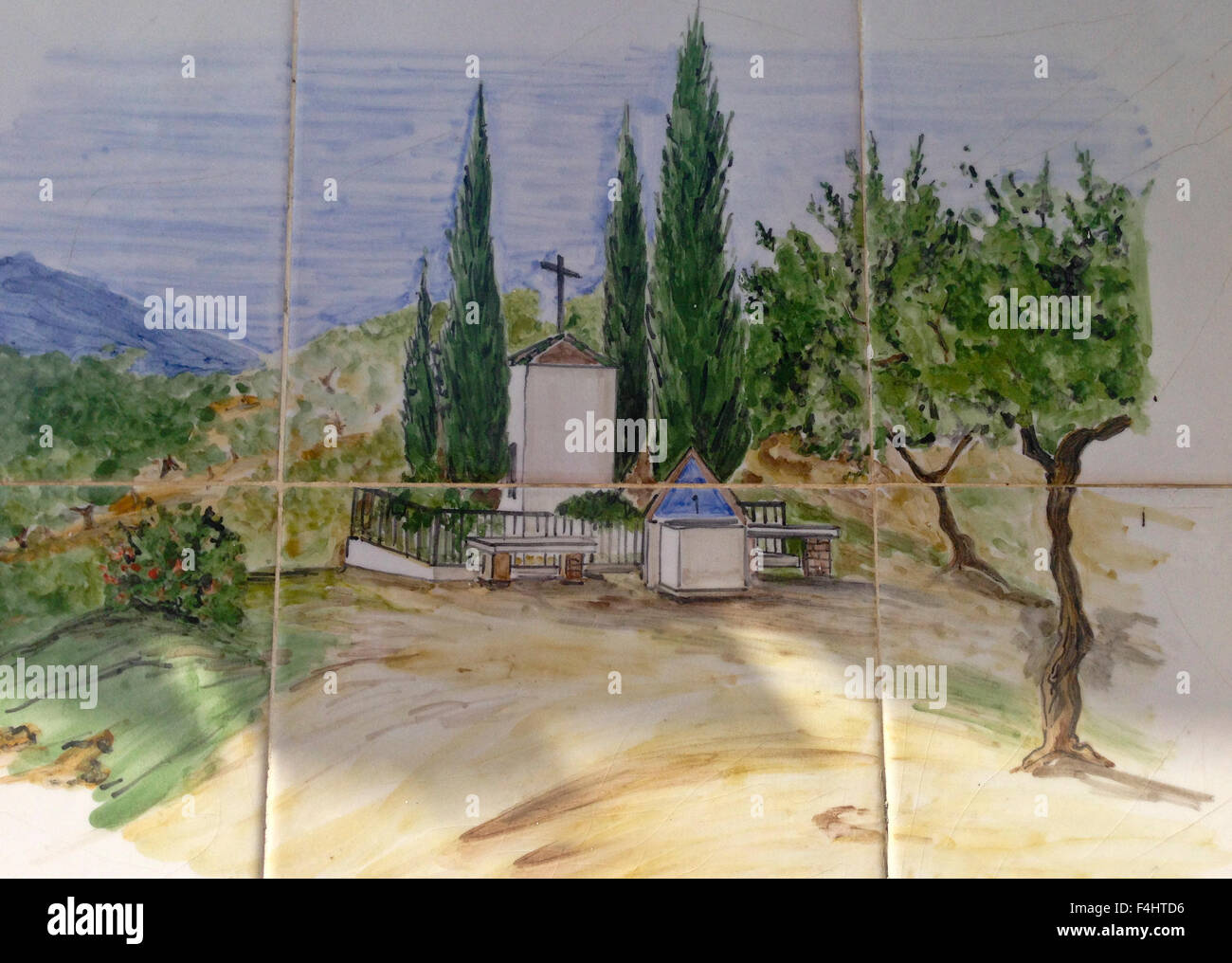 GUARO, SPAIN, JULY 7, 2015: Colorful glazed tiles wall that recreates ...