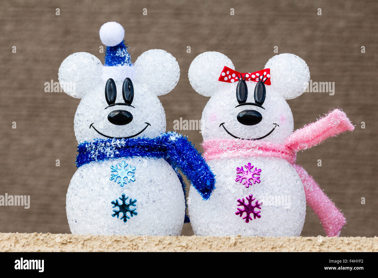 Japan, Yamato Koriyama. Two smiling christmas snowdrop bears. male ...
