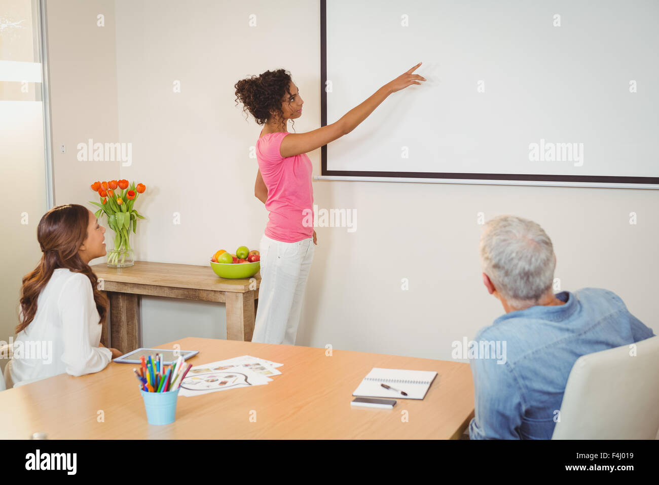 Woman pointing finger board hi-res stock photography and images - Alamy