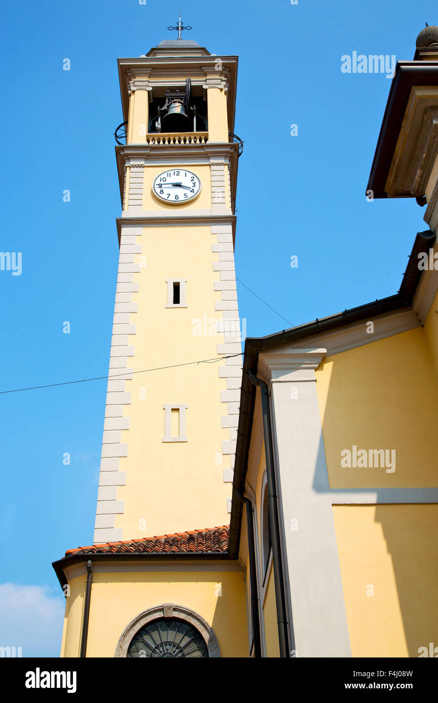 ancien clock tower in italy europe old stone and bell Stock Photo - Alamy