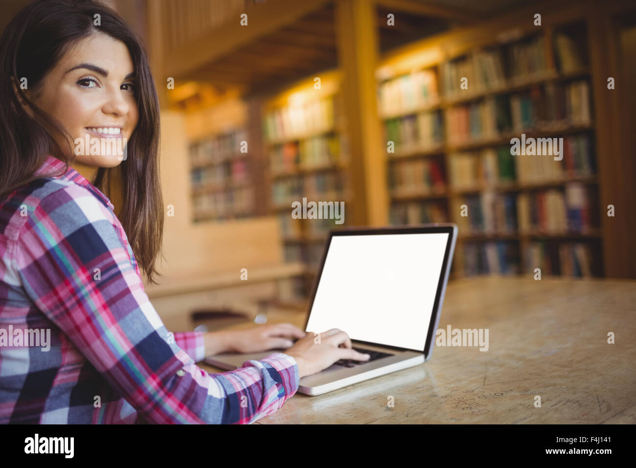 Smiling student laptop using hi-res stock photography and images - Alamy