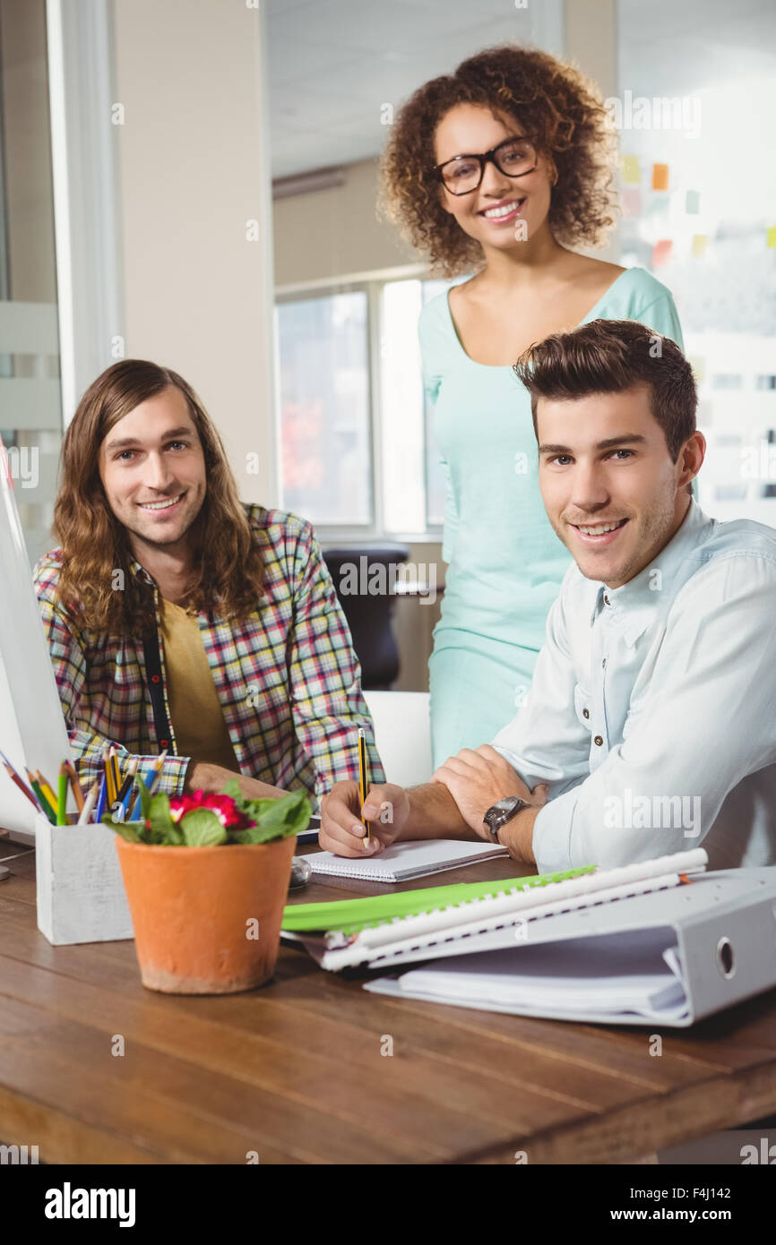 Portrait of happy creative business colleagues Stock Photo - Alamy