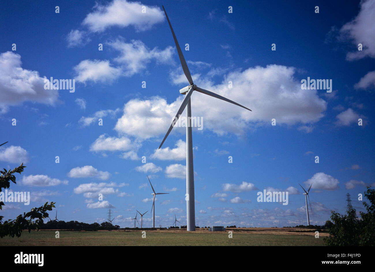 U.K. Wind farm turbine blue sky clouds Stock Photo - Alamy