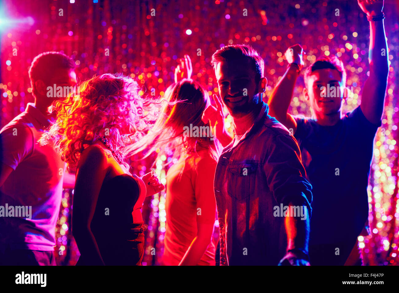 Dancing young people having party Stock Photo - Alamy