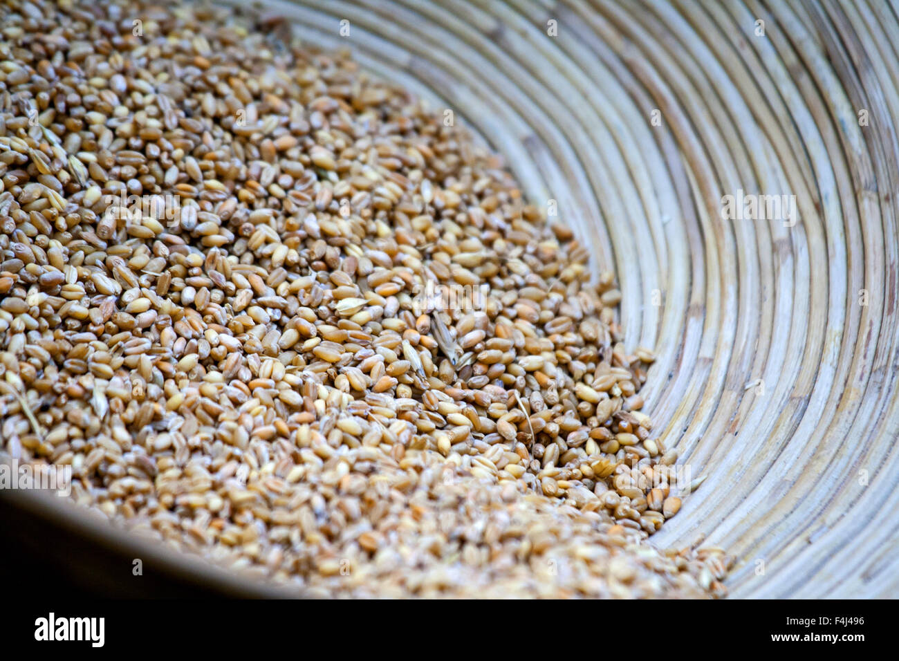 Wheat grain in a wooden basket Stock Photo - Alamy