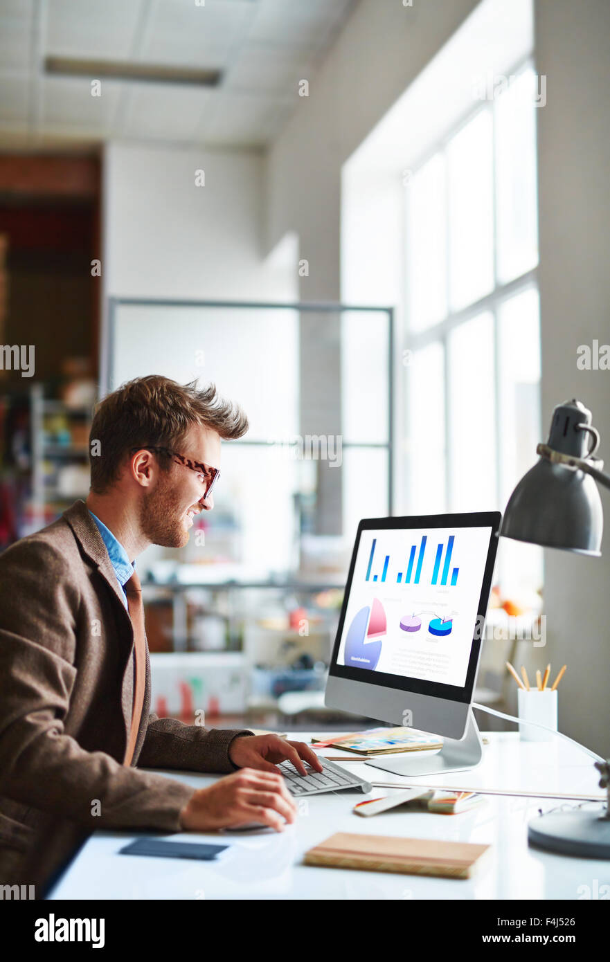 Analyzing financial data in hi-res stock photography and images - Alamy