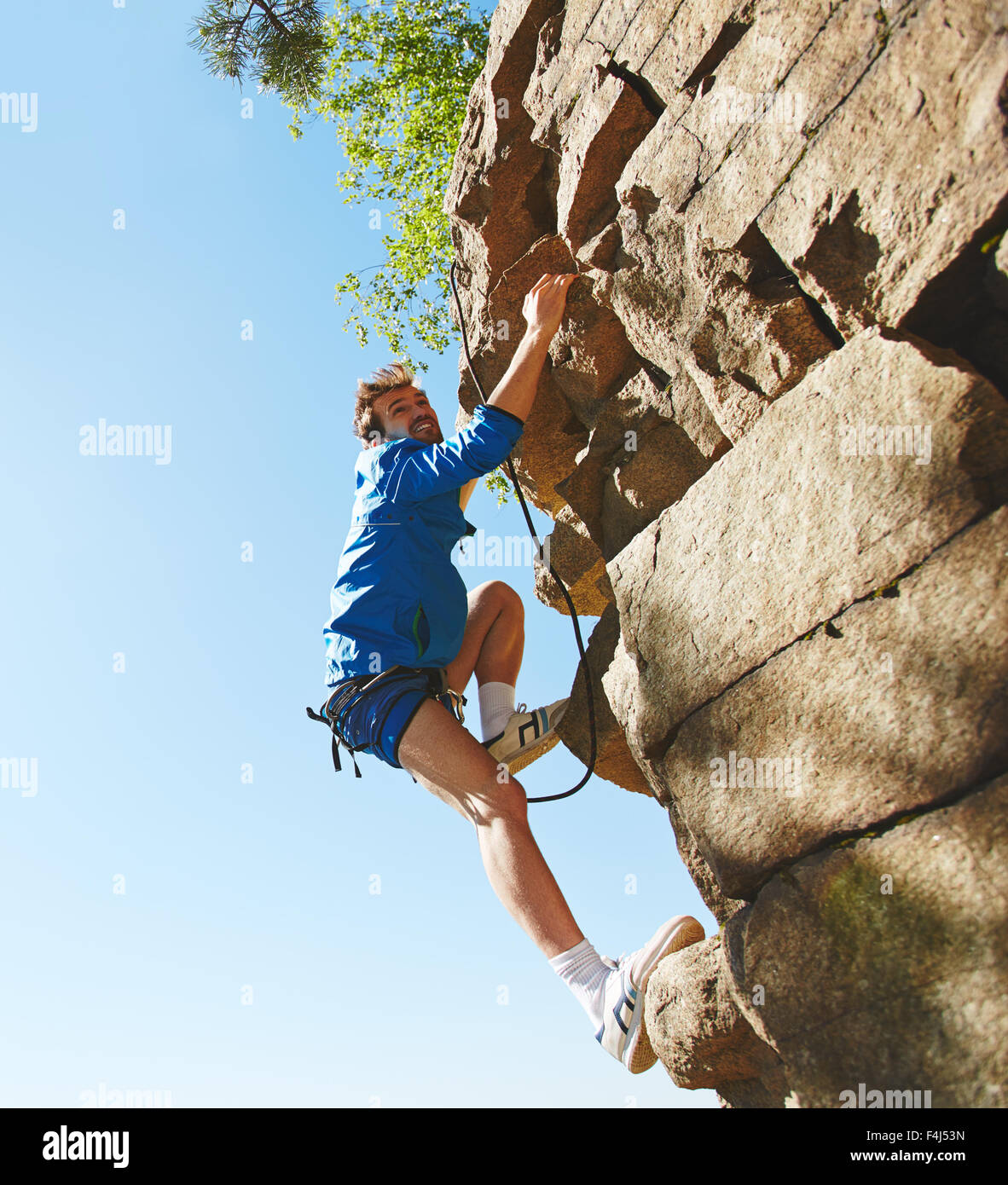 Rappeling lover climbing the rock Stock Photo - Alamy