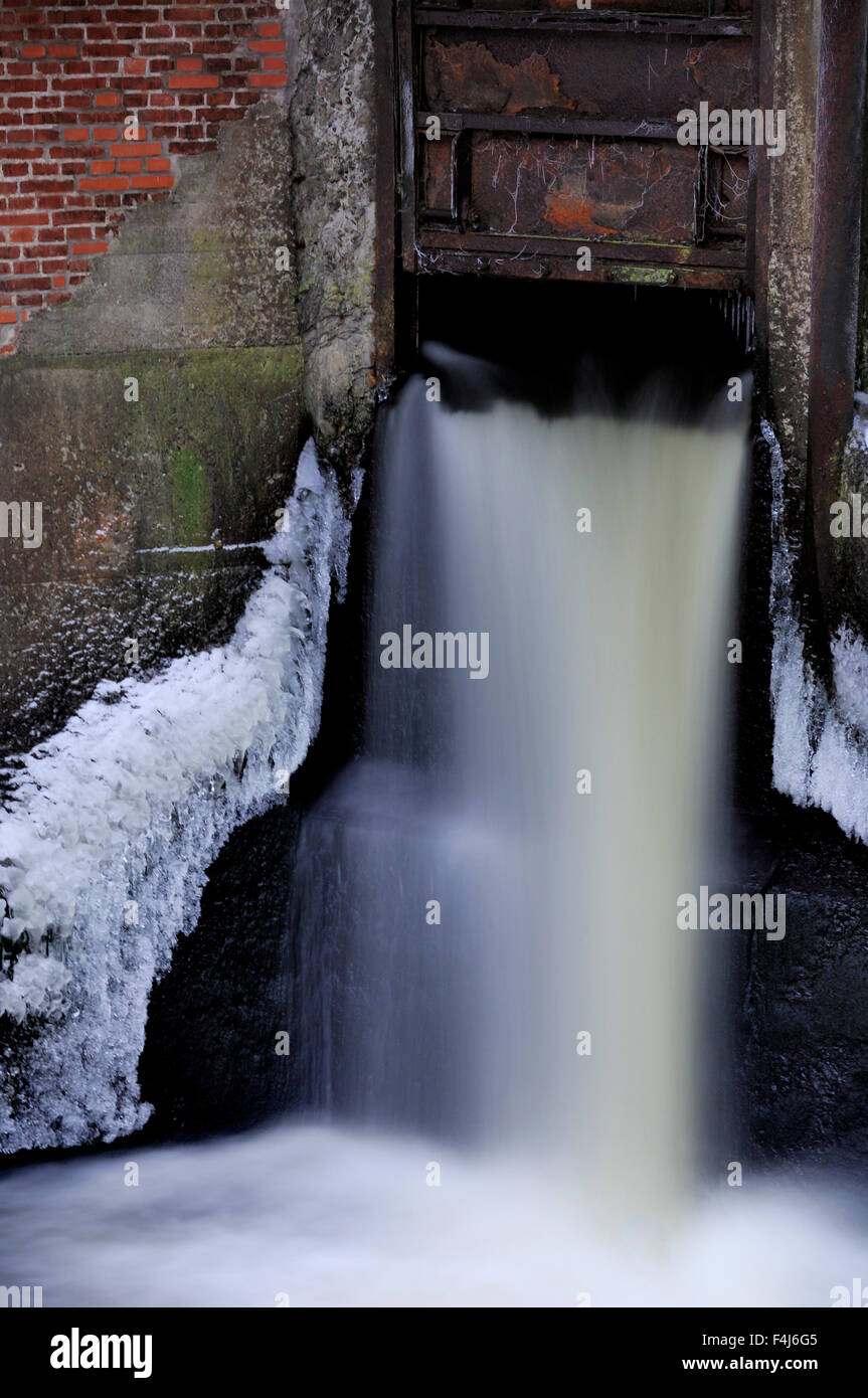 Waterfall at a gate Stock Photo - Alamy