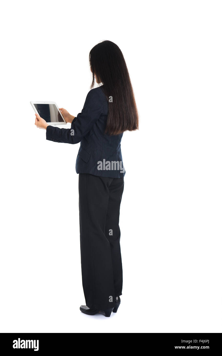 Asian girl with tablet back view Stock Photo - Alamy