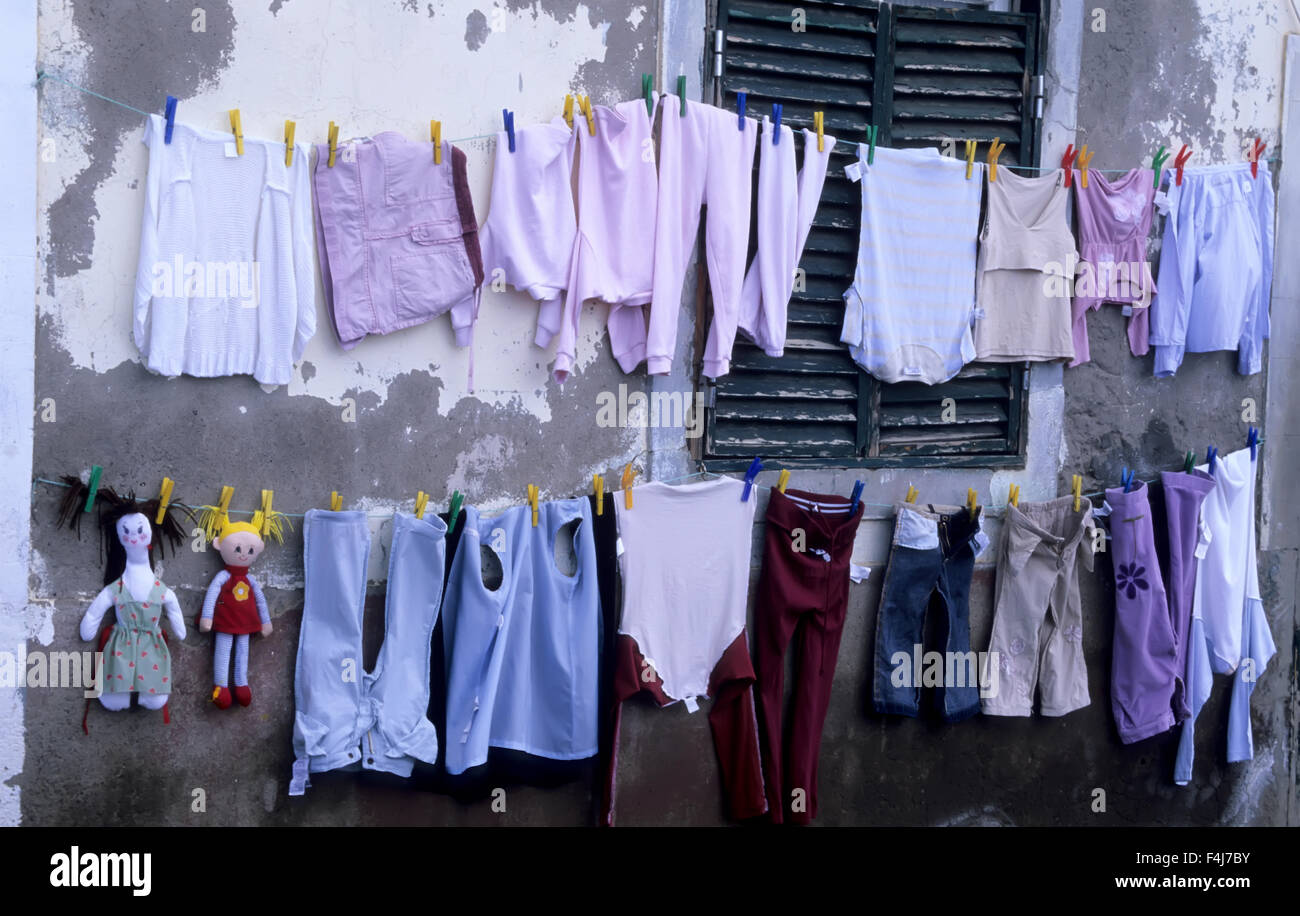 Hanging clothes out to dry hi-res stock photography and images - Alamy
