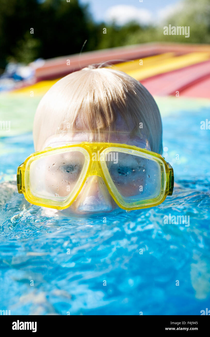 Boy in a swimming pool, Finland Stock Photo - Alamy