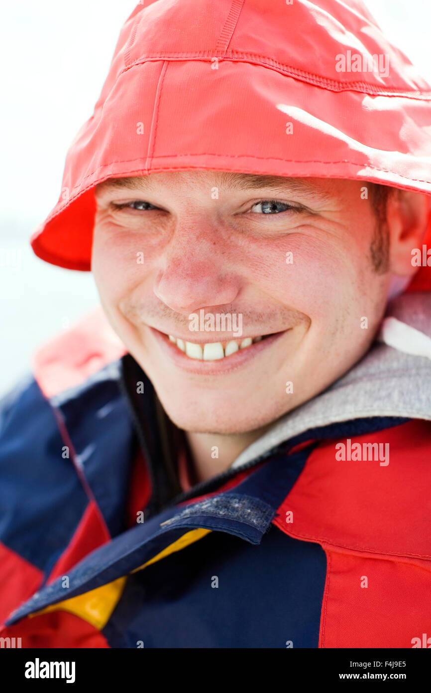 Portrait of a smiling man sailing, Sweden Stock Photo - Alamy