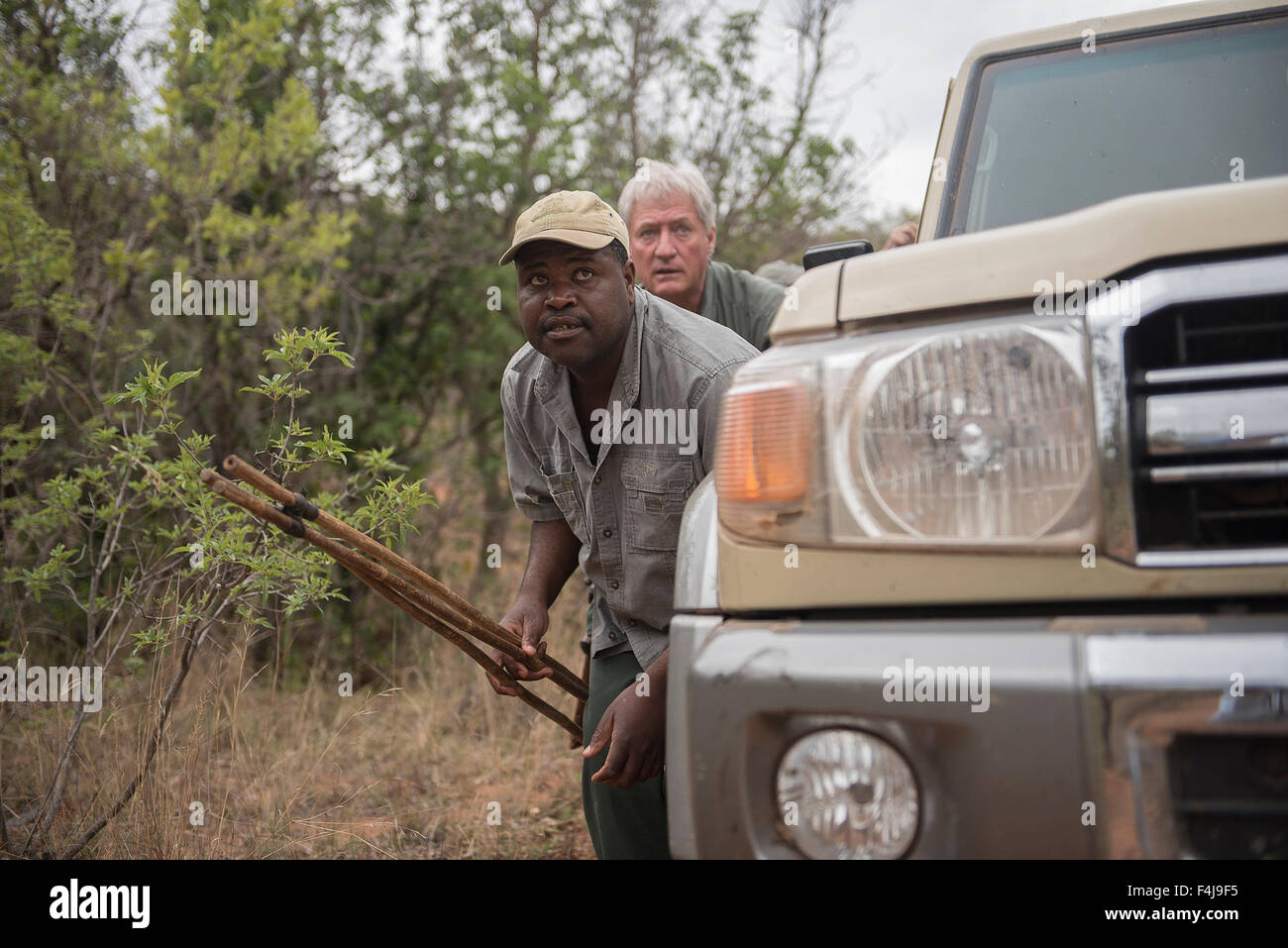 Tracker, Frans Baloi, front, together with professional hunter, Stan ...