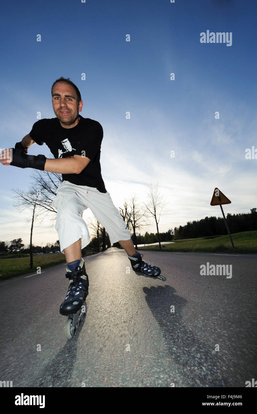 A man in-line skating, Sweden Stock Photo - Alamy