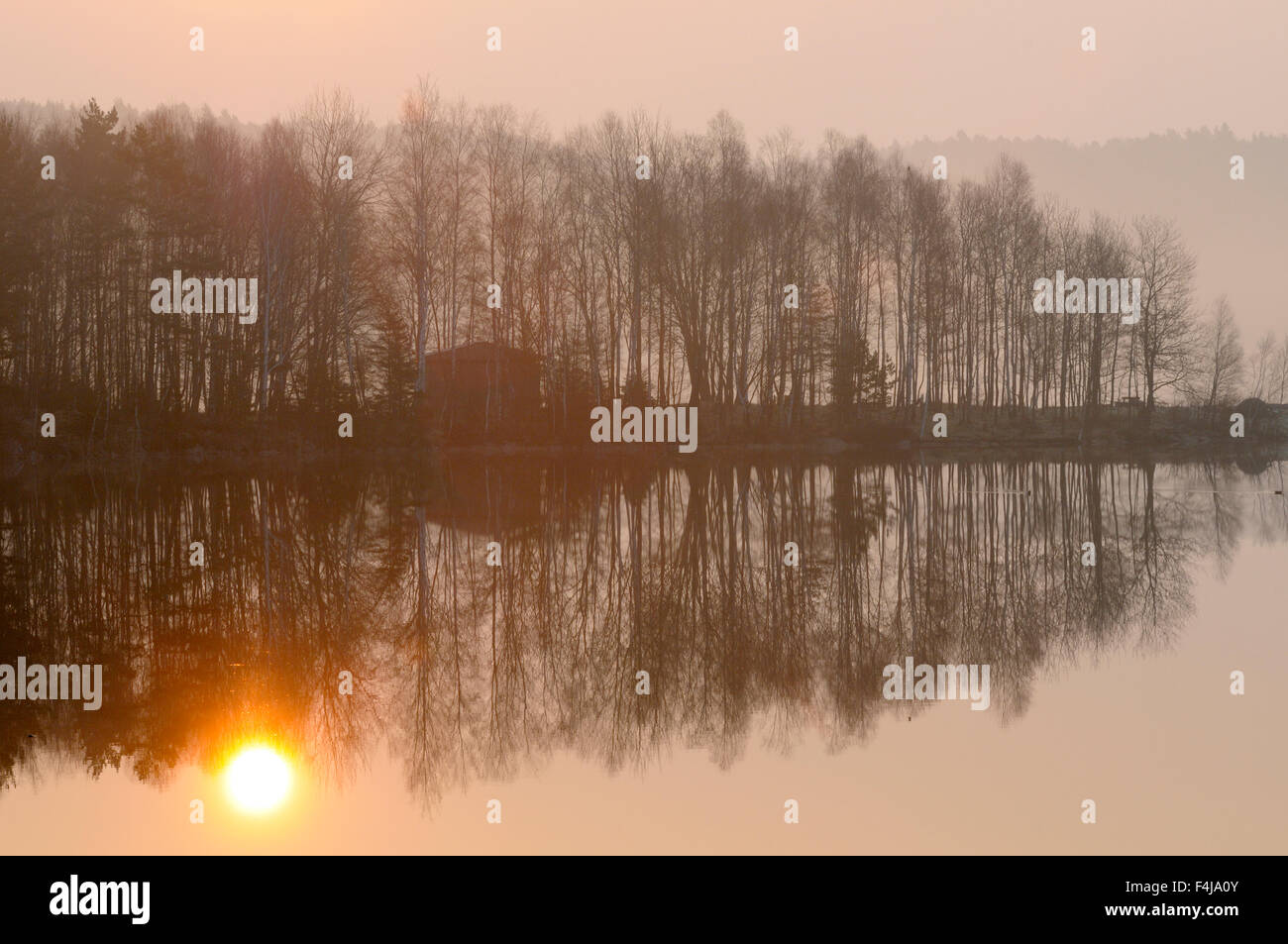 Dawn at a lake Stock Photo - Alamy