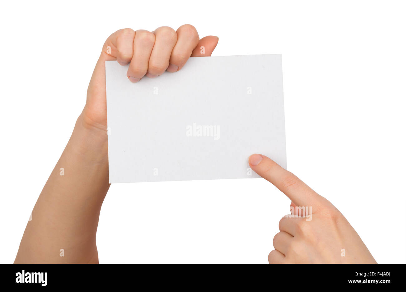Humans right finger pointing at small blank paper Stock Photo - Alamy