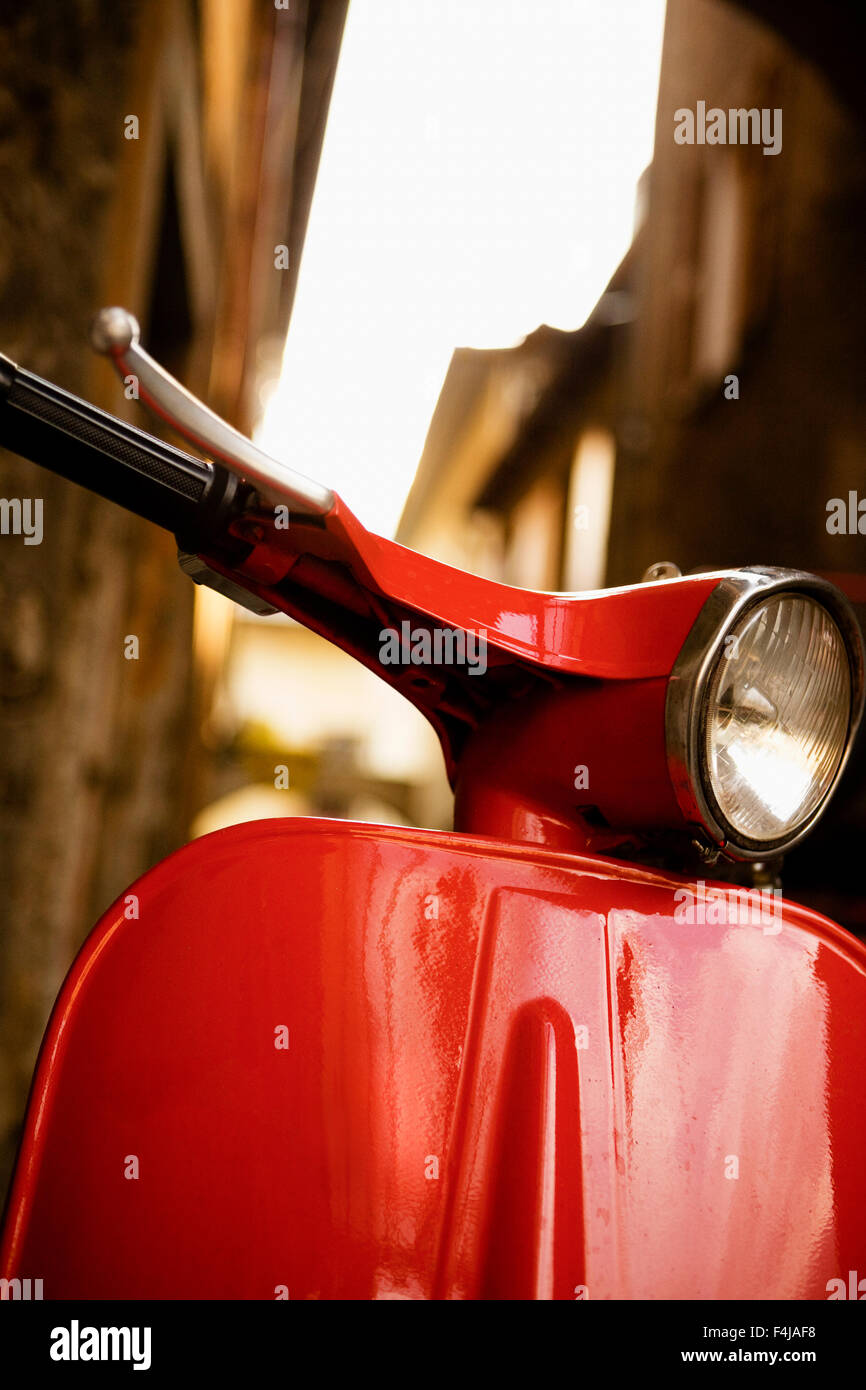 A red motor scooter, Italy Stock Photo - Alamy