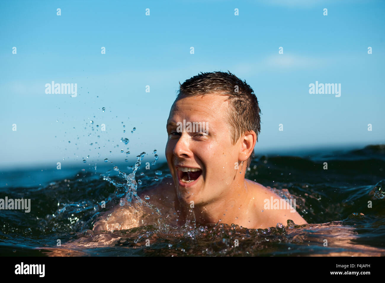 A man bathing, Sweden Stock Photo - Alamy