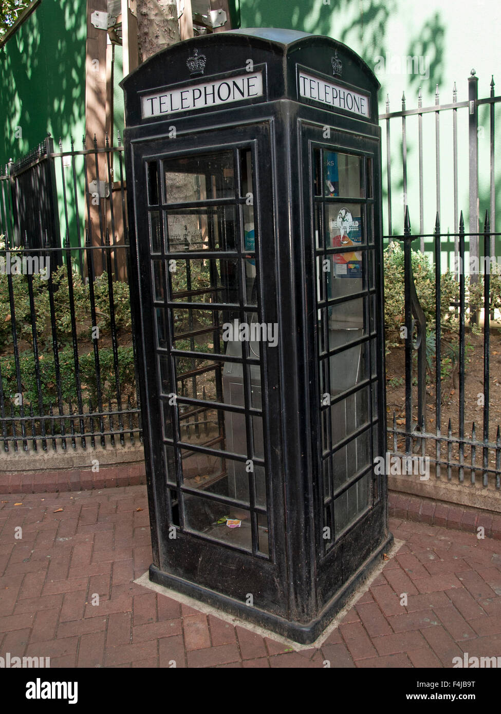 Typical black telephone box in London. England. Great Britain Stock ...