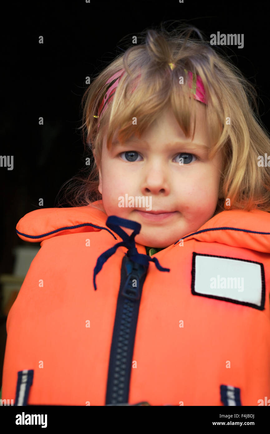 Girl with a life jacket, Sweden Stock Photo - Alamy