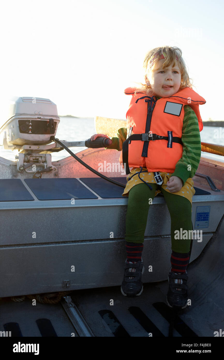 Girl driving motorboat hi-res stock photography and images - Alamy