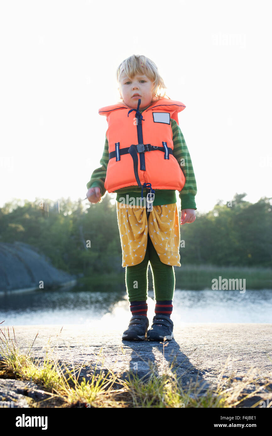 Girl with a life jacket, Sweden Stock Photo - Alamy