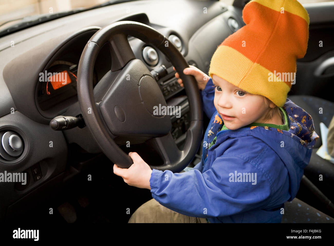 Boy in a car hi-res stock photography and images - Alamy