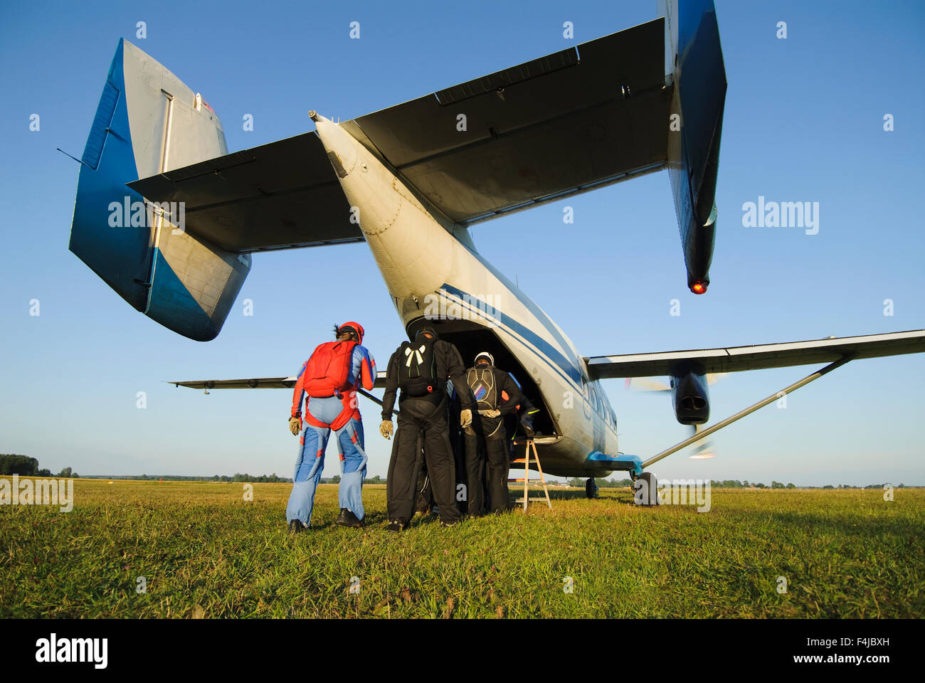 Parachutists boarding a small airplane, Sweden Stock Photo - Alamy