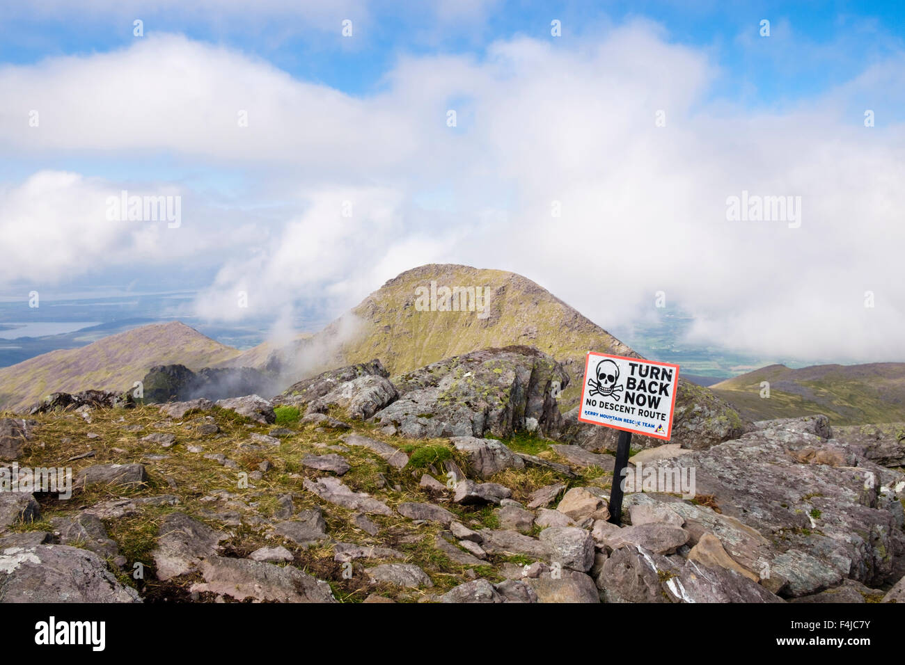 Turn back now sign with skull and crossbones on Carrauntoohil mountain ...