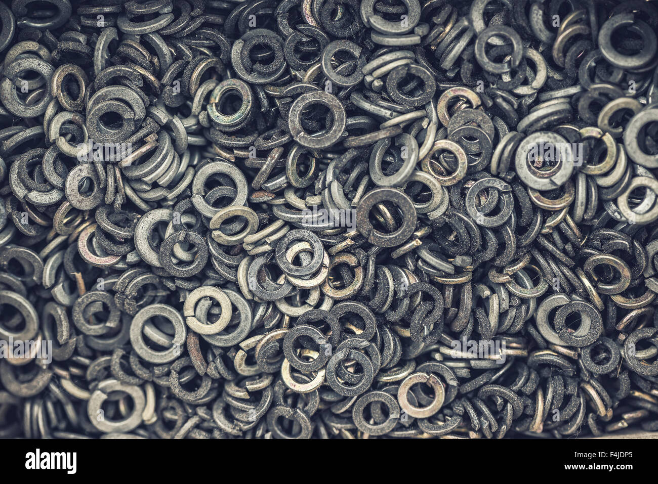 Metal screw plain washers pile, industrial texture background ...