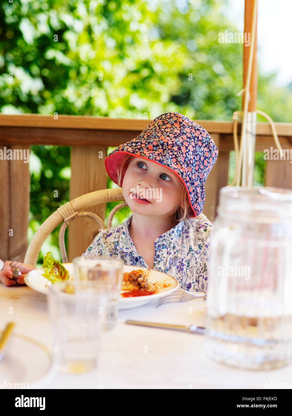 A girl having lunch Stock Photo - Alamy