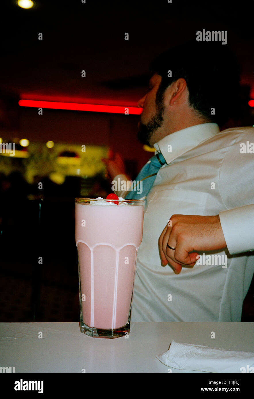A man with a milkshake Stock Photo - Alamy