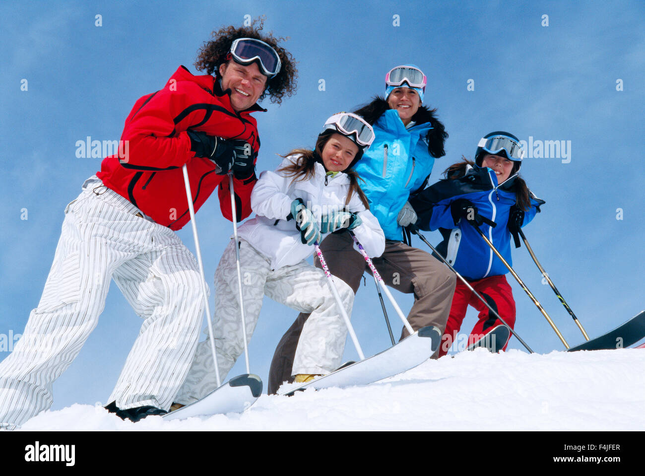 A family skiing Stock Photo - Alamy