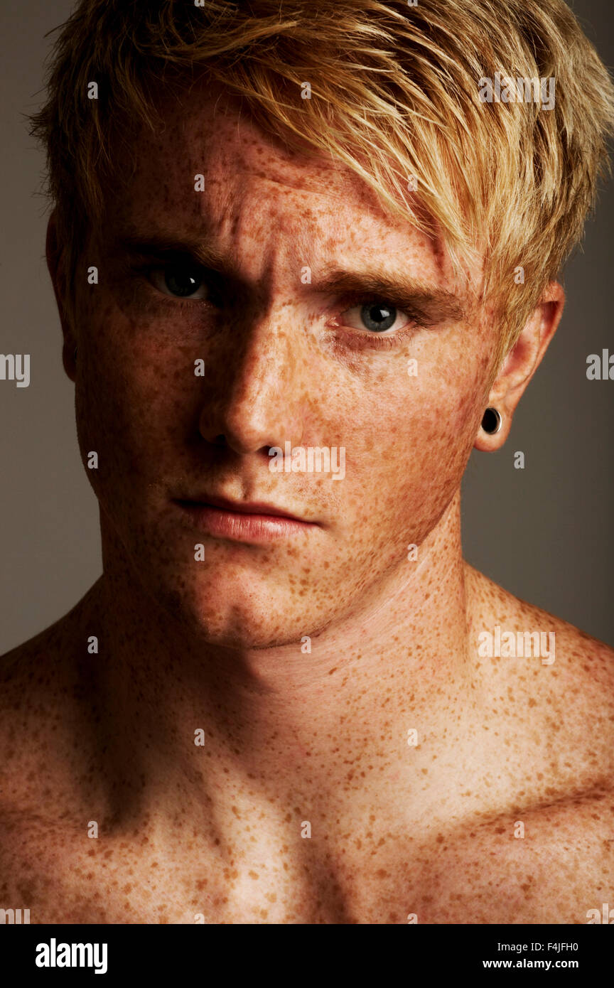 Freckled man looking at camera Stock Photo - Alamy