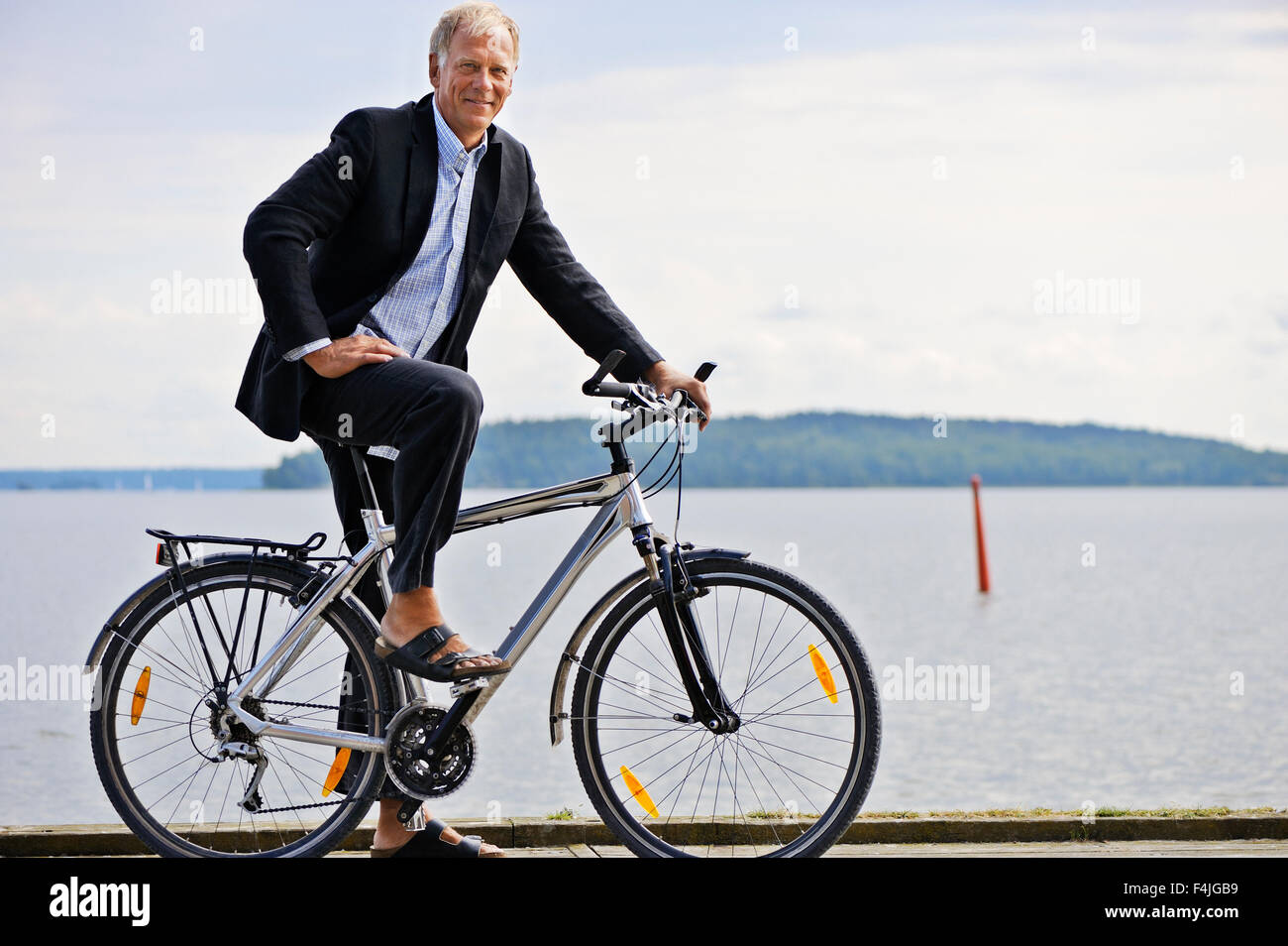 Man on bicycle Stock Photo - Alamy
