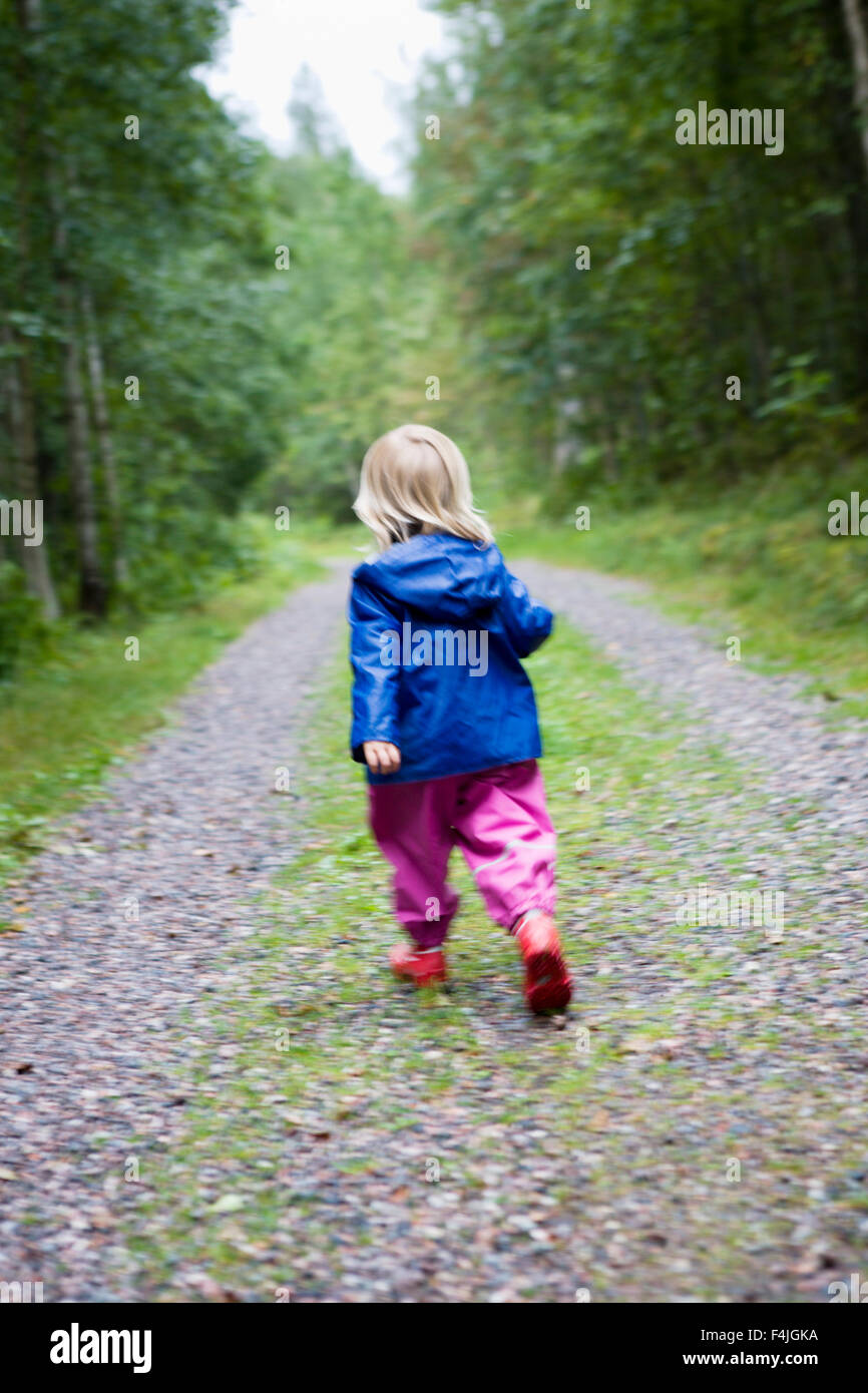 Girl running forest Stock Photo - Alamy