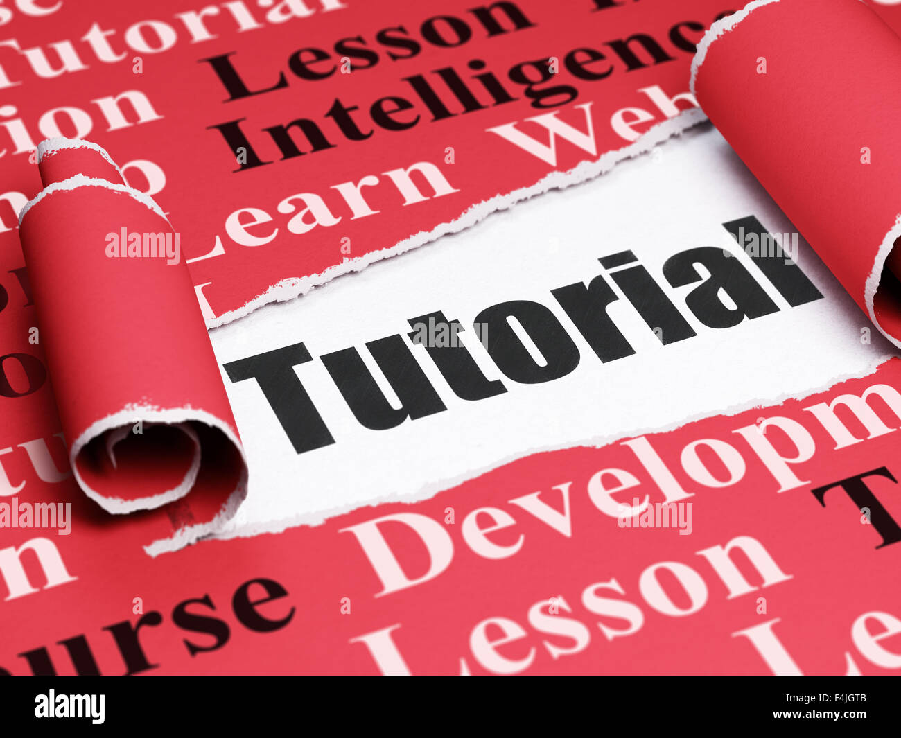 Learning concept: black text Tutorial under the piece of torn paper ...