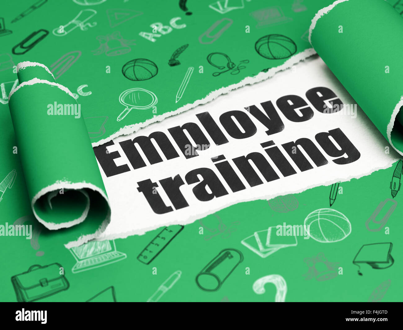 Studying concept: black text Employee Training under the piece of torn ...